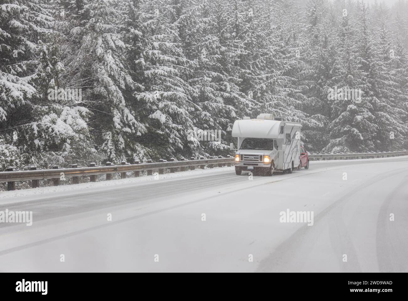 RV driving on fresh snow after a rare winter storm brought snow to the ... RV driving on fresh snow after a rare winter storm brought snow to the ...