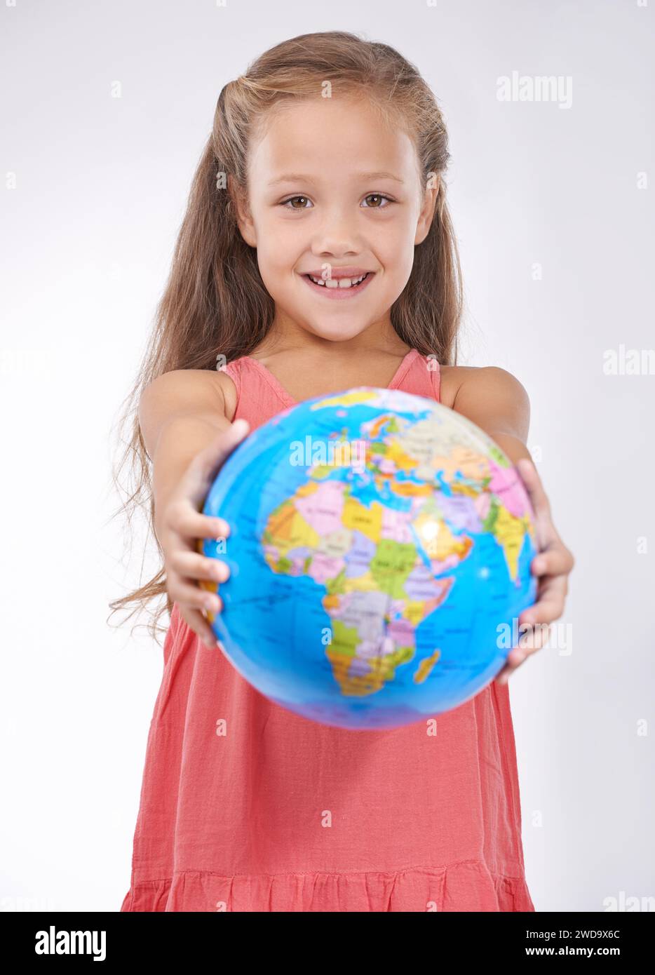 Kid, portrait and globe in studio with world, planets and city for ...
