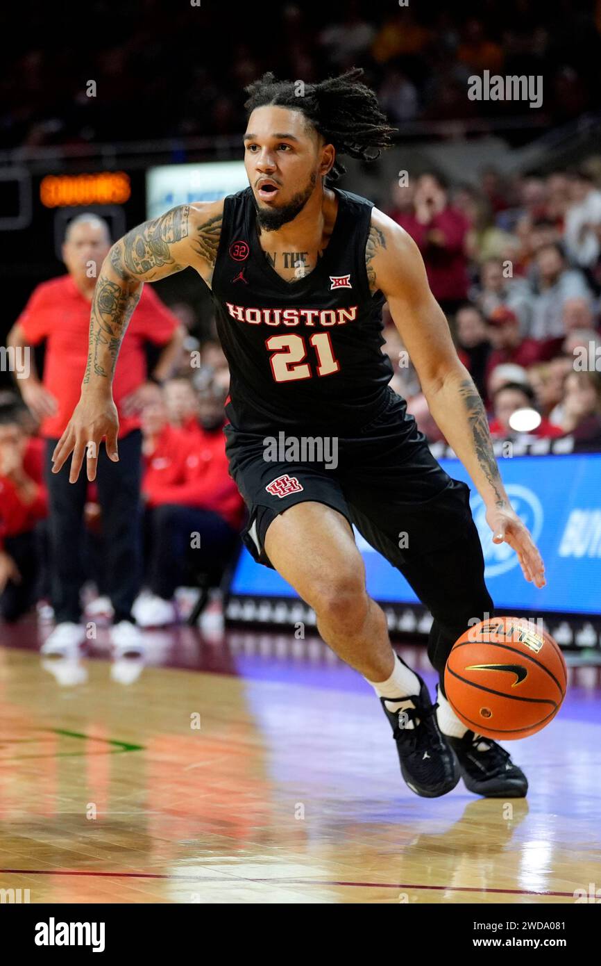 Houston guard Emanuel Sharp (21) drives to the basket during the first ...