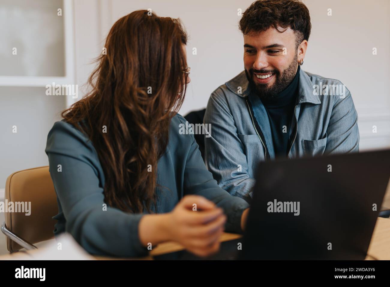 Male employee crosses professional boundaries, engaging in ...