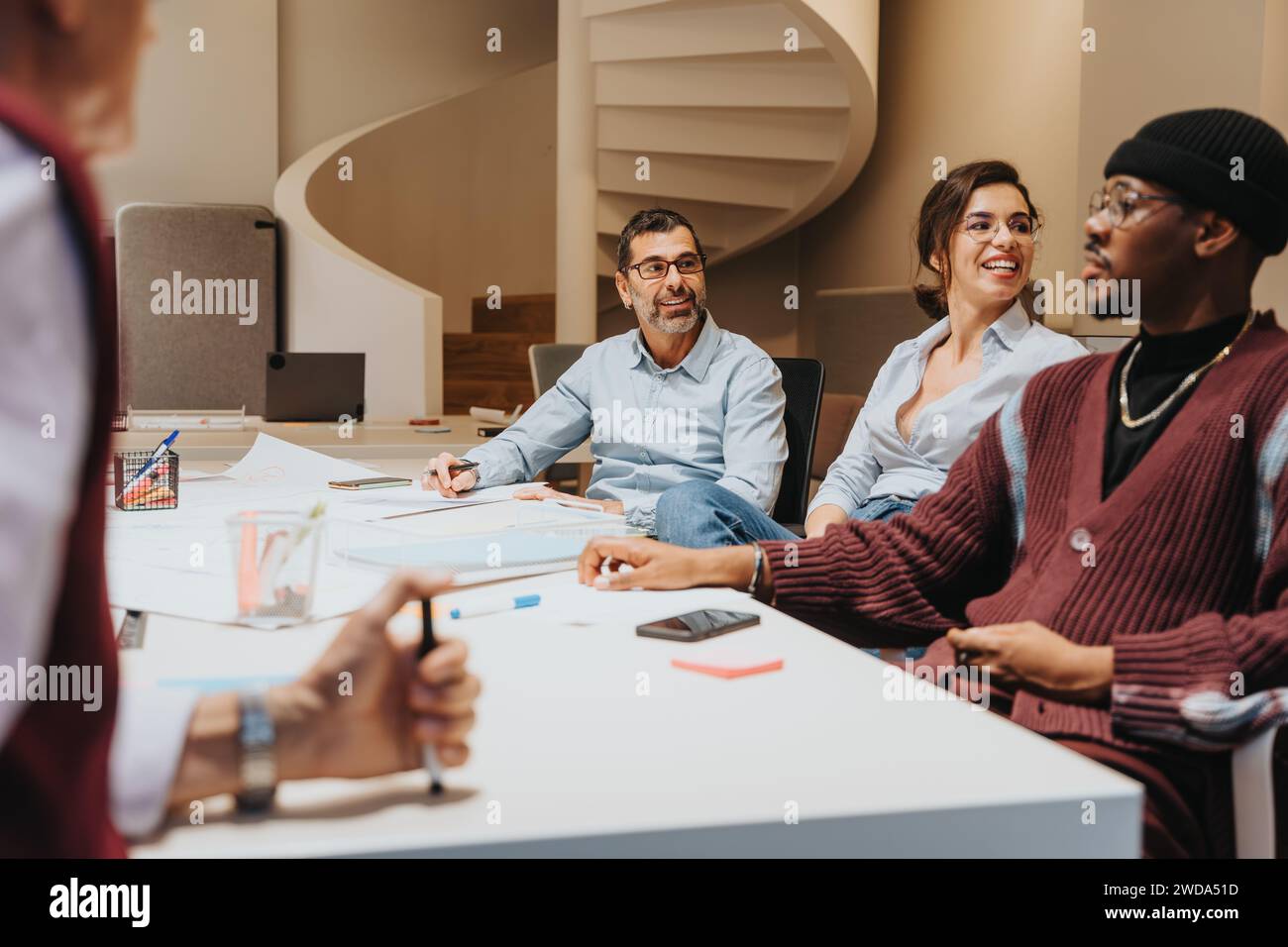 Diverse collaborative group professionals engaged hi-res stock ...