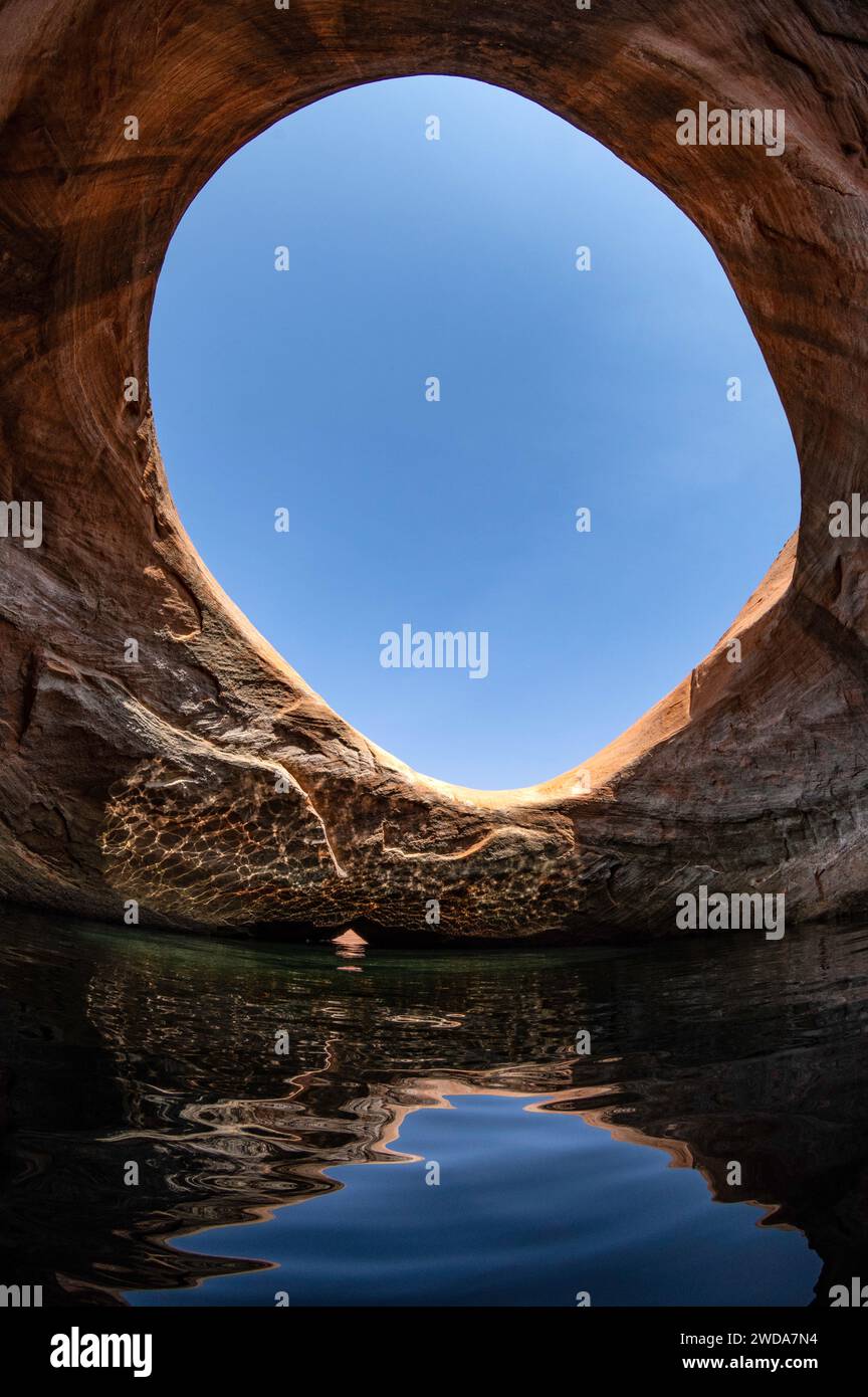 Kayaking inside Double-O arch, Lake Powell, Utah Stock Photo - Alamy