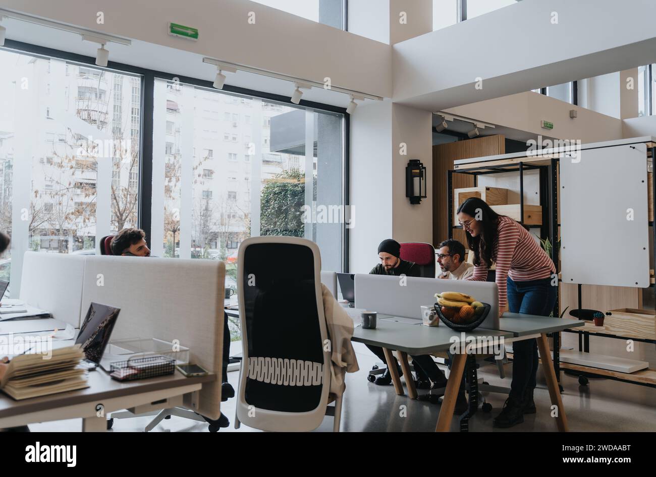 Successful multi-generational team collaborating on business strategy ...