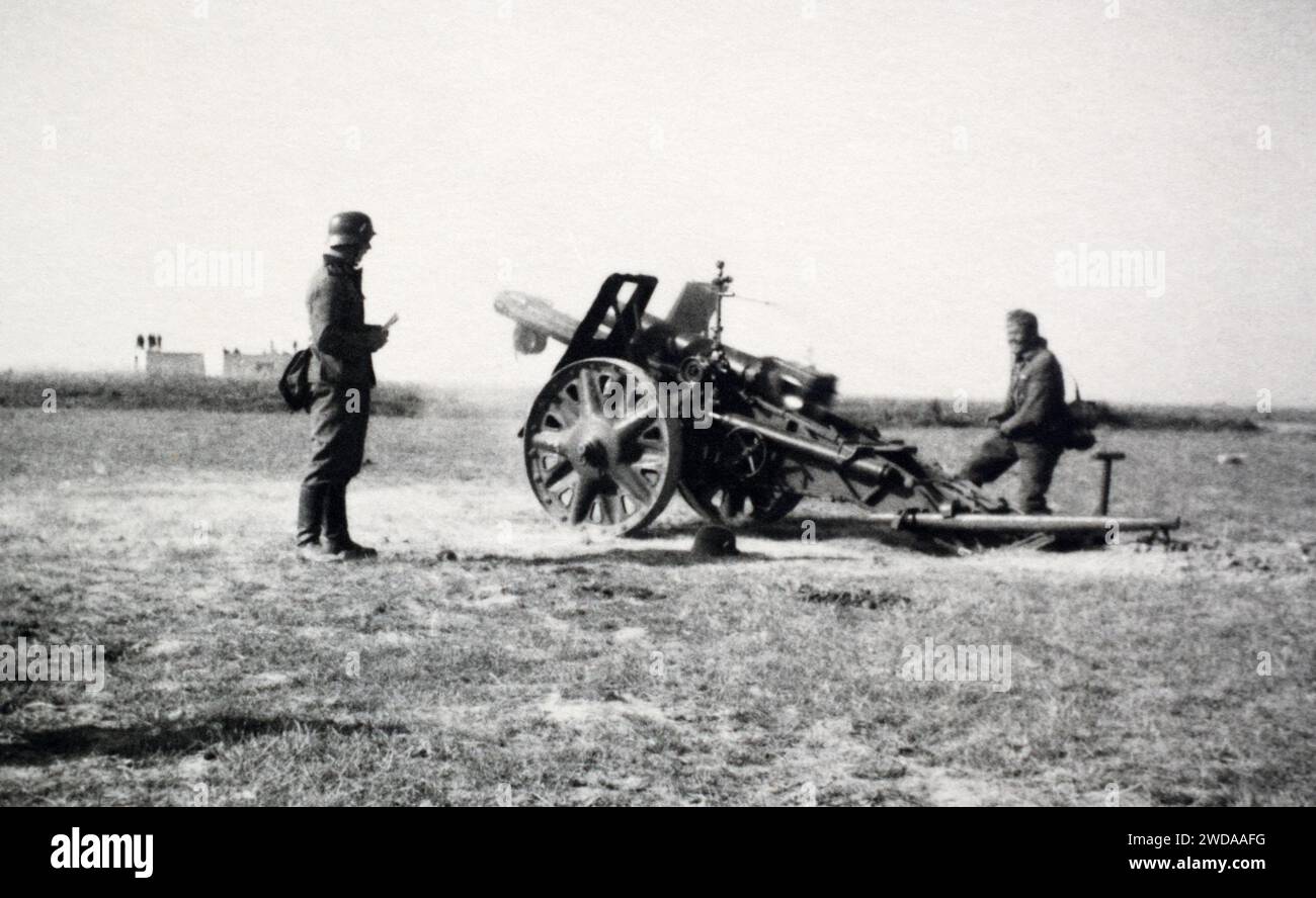 A German army 15 cm sIG 33 heavy infantry gun after being fired during ...