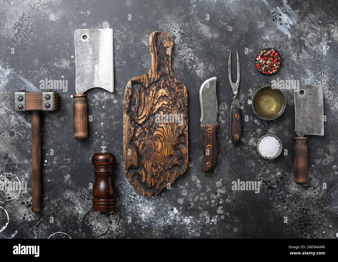 Kitchen meat utensils set on dark kitchen background. Meat cleaver,fork ...