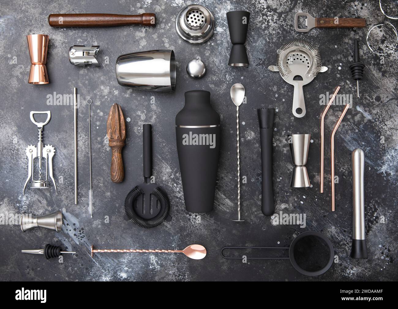 Various cocktail bar utensils set. Strainer,shaker,jigger,straw,juicer ...