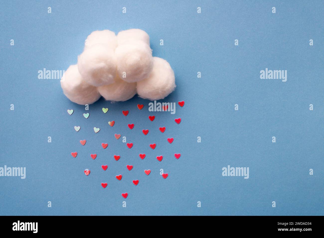 Cloud with rain of hearts Stock Photo - Alamy