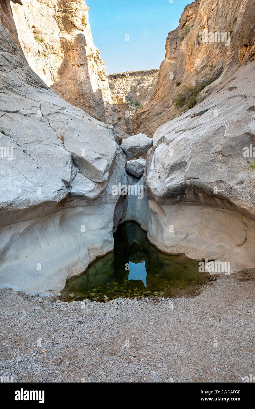 Photograph of the Ernst Tinaja and it's very beautiful geology. Big ...
