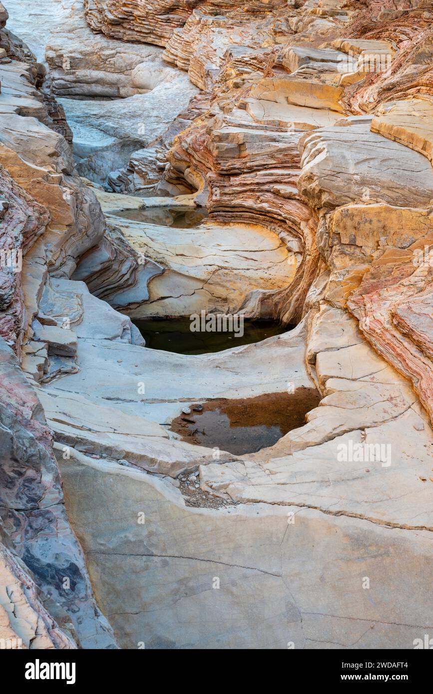 Photograph of the Ernst Tinaja and it's very beautiful geology. Big ...