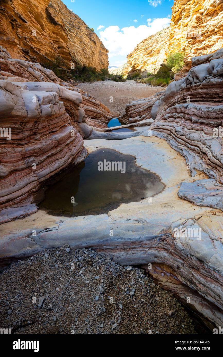 Photograph of the Ernst Tinaja and it's very beautiful geology. Big ...