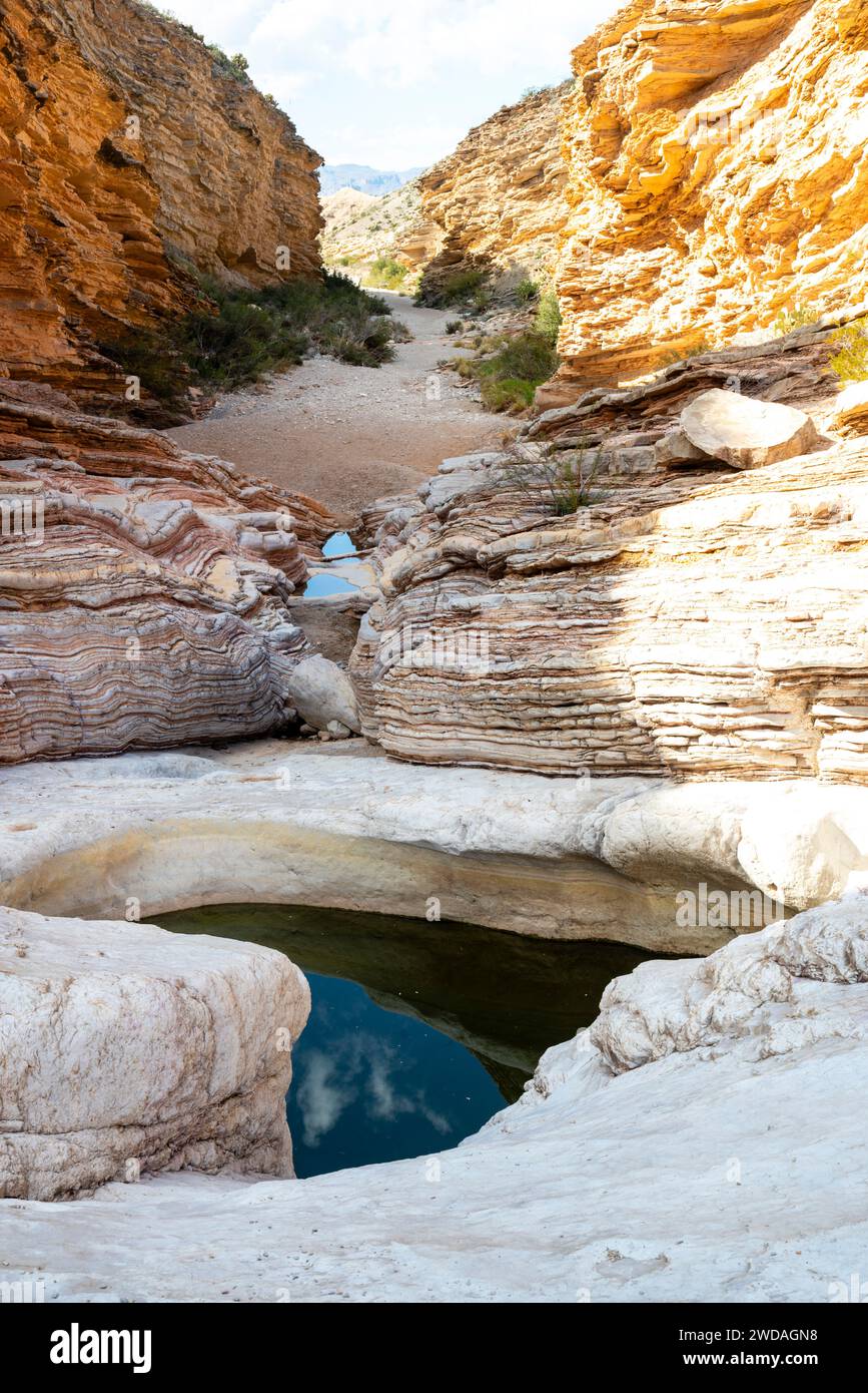 Photograph of the Ernst Tinaja and it's very beautiful geology. Big ...