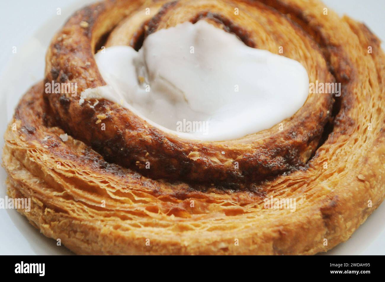 Copenhagen, Denmark /19 January 2024/. Danish kringle cake on plate in ...