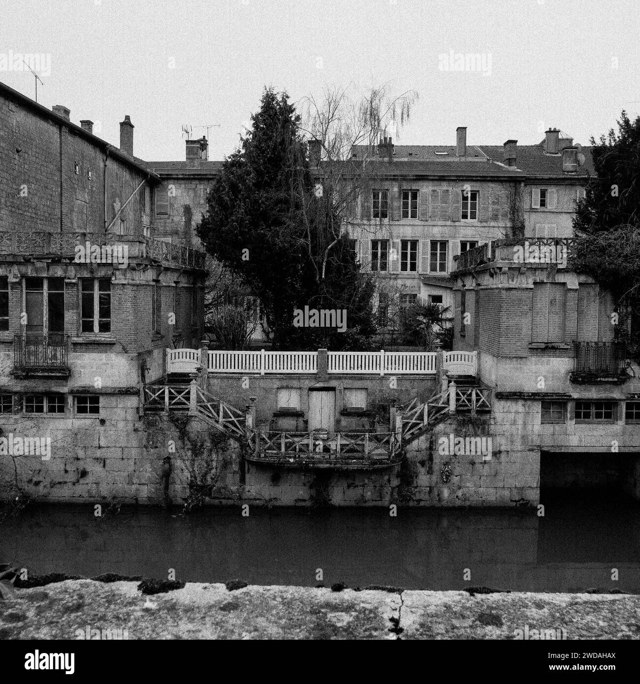 Old house on the riverbank, Verdun, Meuse, Grand-Est region, France ...