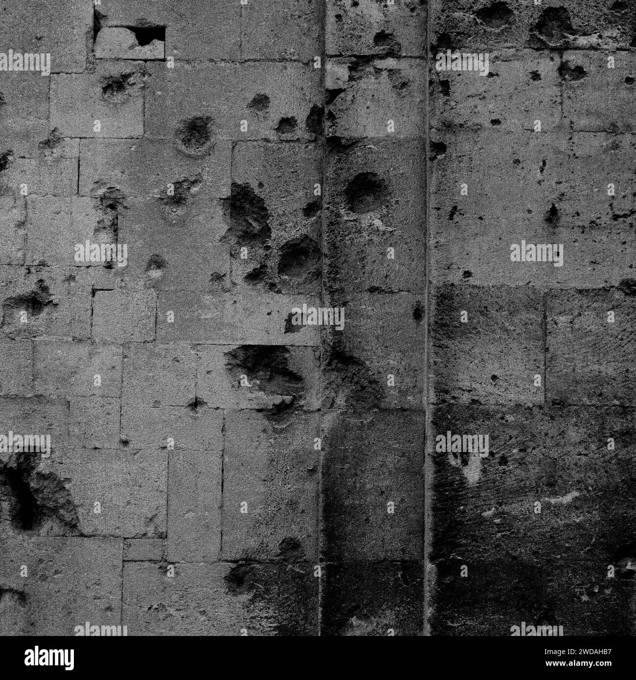 Bullet holes in the stone wall of the cathedral Notre-Dame de Verdun ...