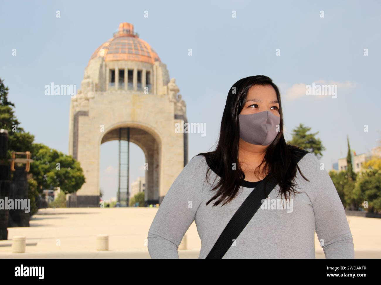 Latin woman with protection mask in mexico city with the new normal and ...