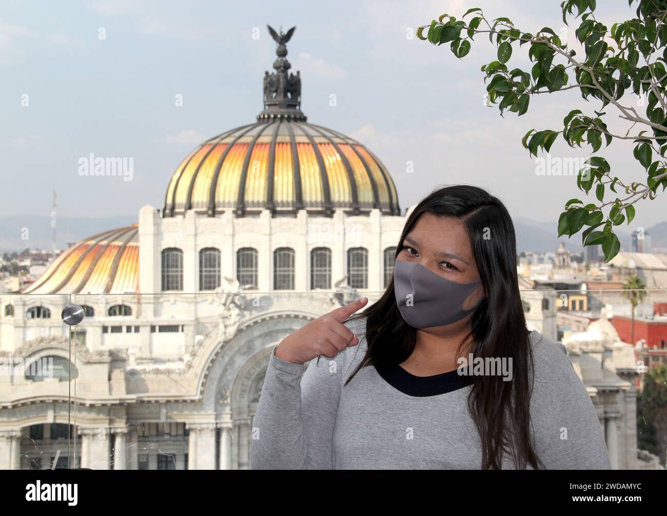 Latin woman with protection mask in mexico city with the new normal and ...