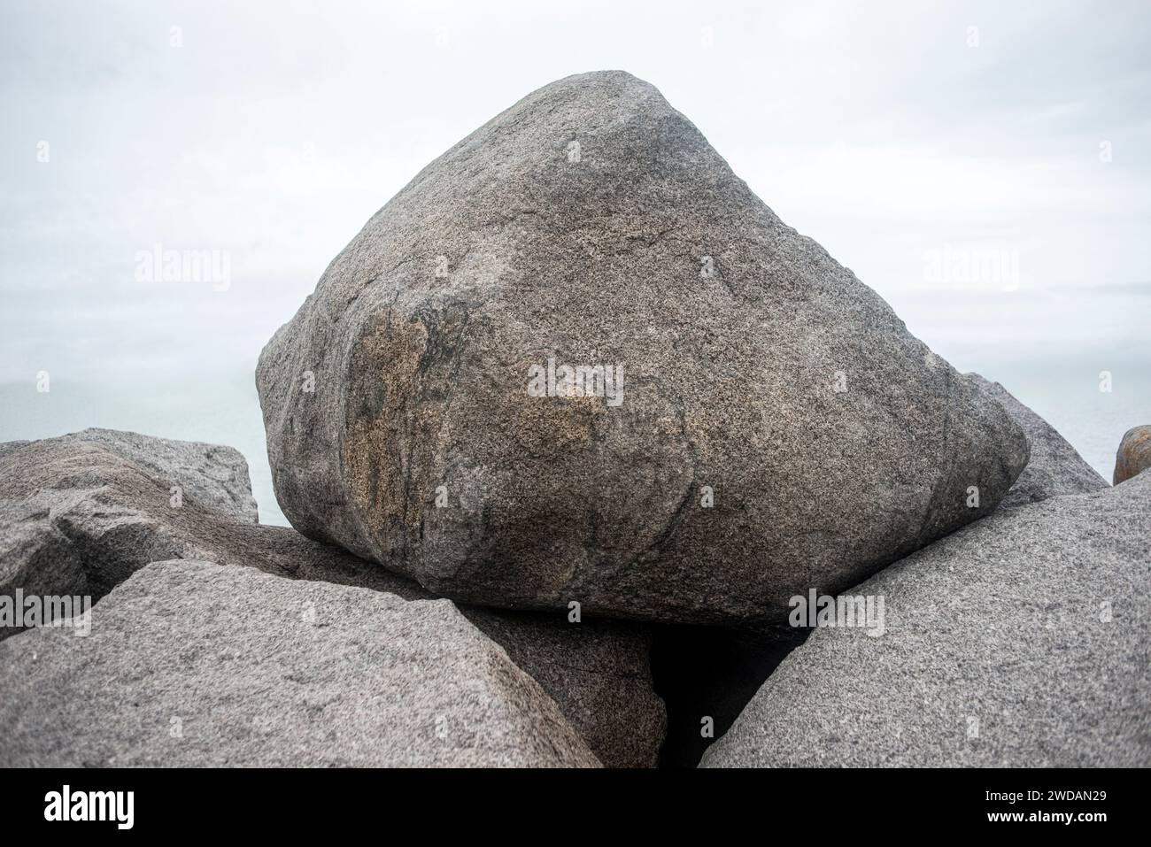 granite boulders used as sea defence against coastal erosion Stock ...