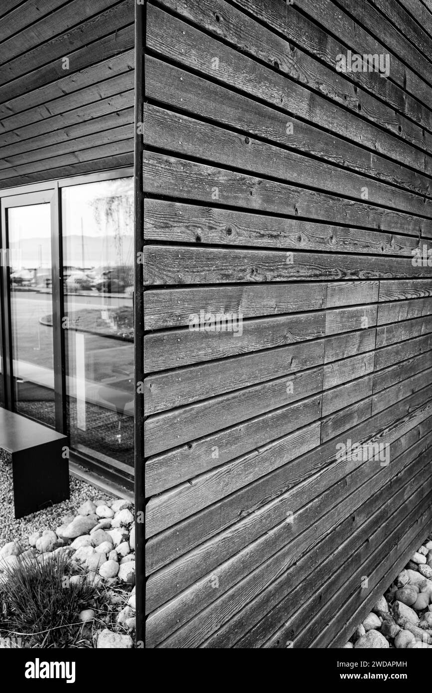 Two benches, one inside and one outside the building Stock Photo - Alamy