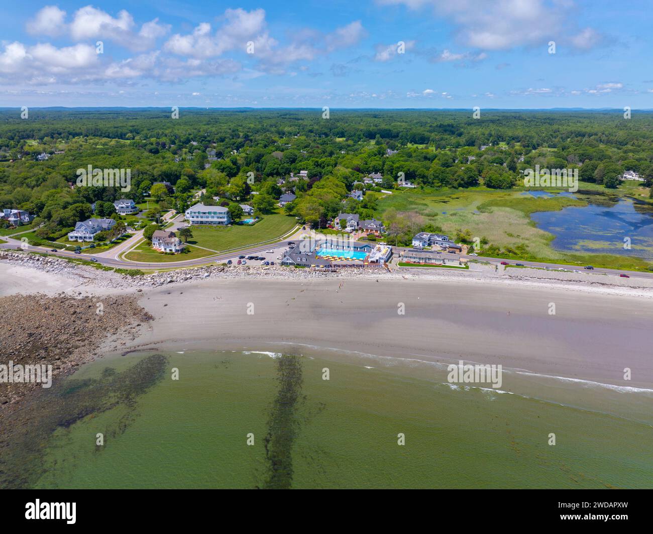 Sawyers Beach and The Beach Club house aerial view in summer with Ocean ...