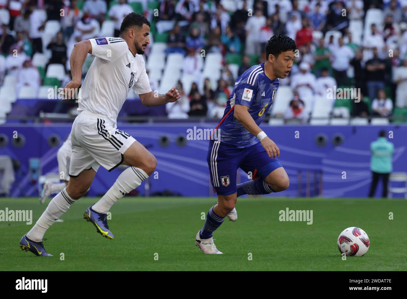 Qatar, Al Rayyan 19 January 2024 - Aymen Hussein of Iraq and Wataru ...