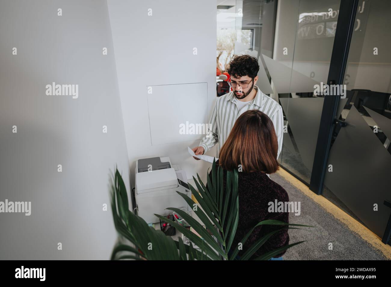 At the office, they print docs and discuss market strategies for ...