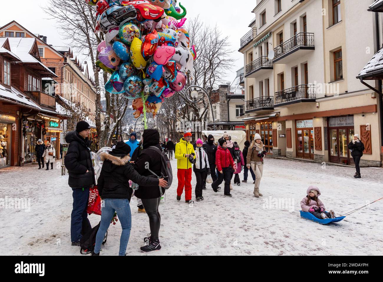 Zakopane, Poland, January 19, 2024. Families take a photo in a public ...