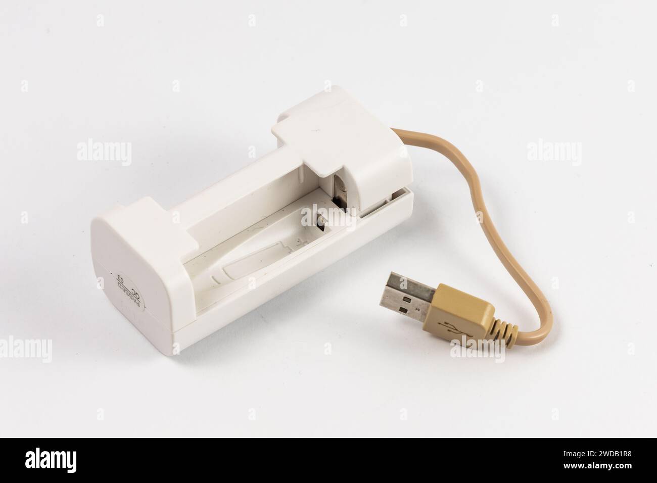 Small and portable battery charger with USB connector to charge by ...