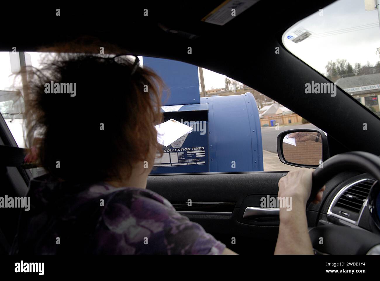 Lewiston /Idaho /USA 19 January 2016 Female using drive through mail ...