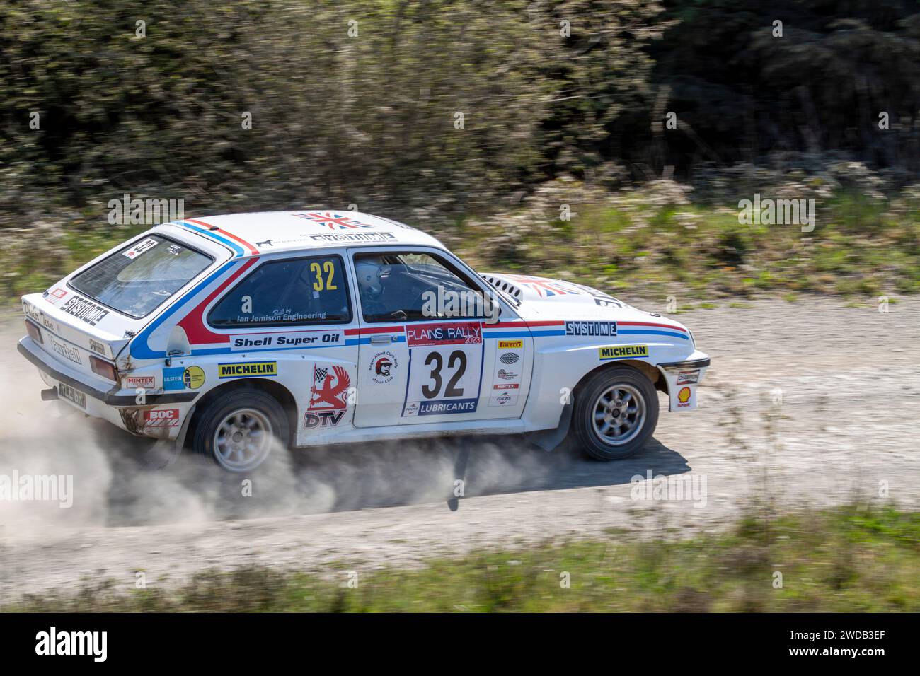 A Vauxhall Chevette rally car can seen racing through Alwen Forest ...