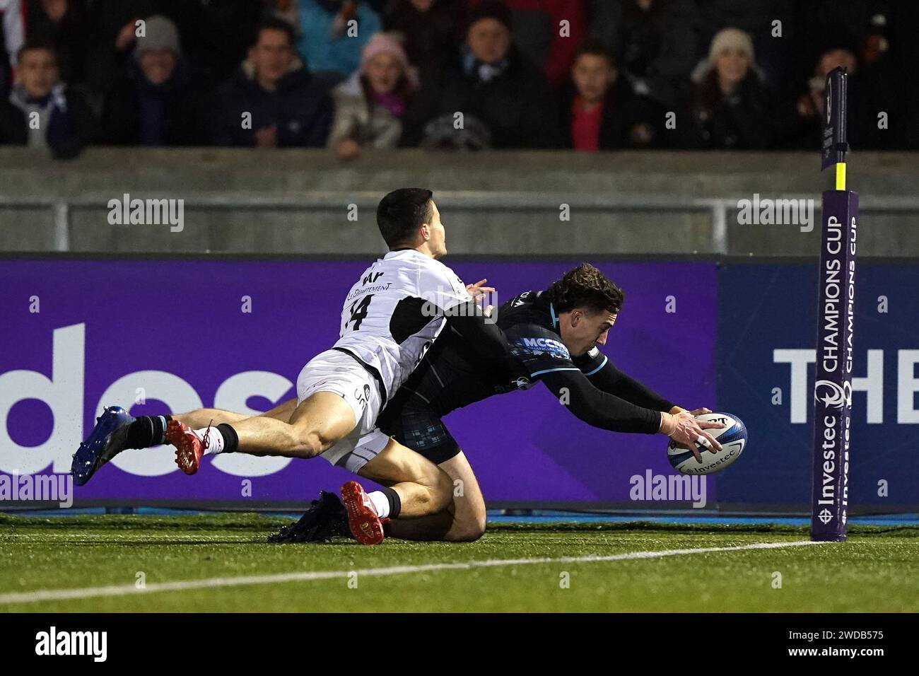 Glasgow Warriors' Josh McKay scores a try before being ruled out during ...