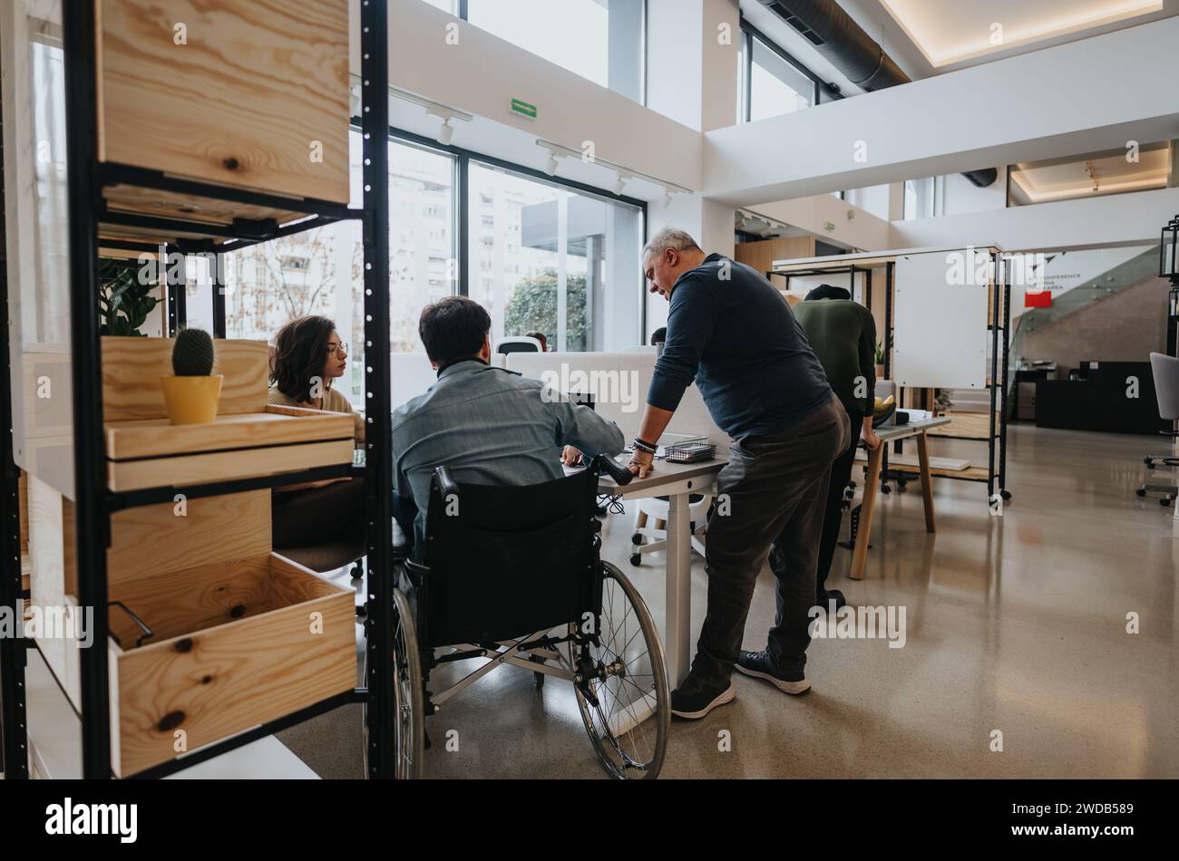 A modern office setting with a diverse team, including a person in a ...