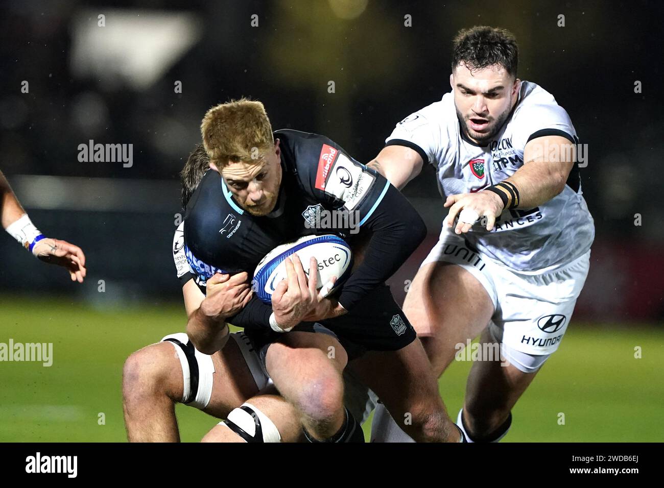 Glasgow Warriors' Kyle Steyn (centre) is tackled during the Investec ...