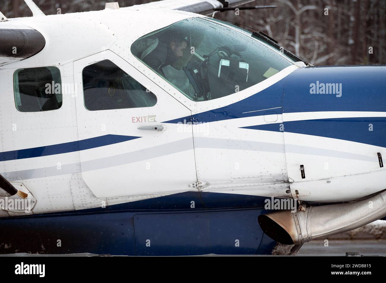 Investigators inspect the cockpit of Southern Airways Express flight ...