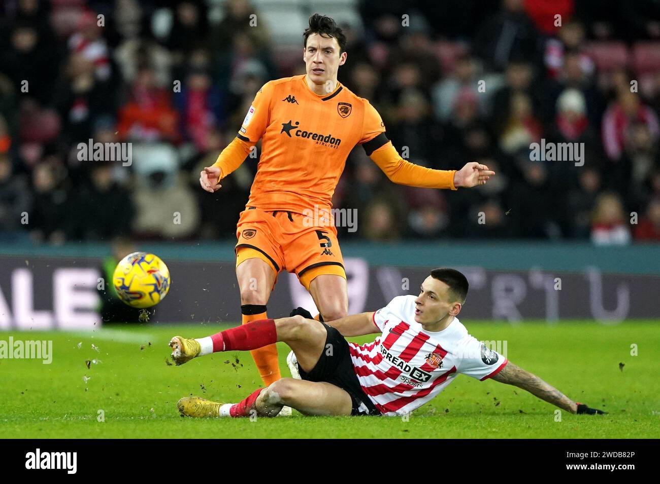 Hull City's Alfie Jones (left) and Sunderland's Nazariy Rusyn battle ...