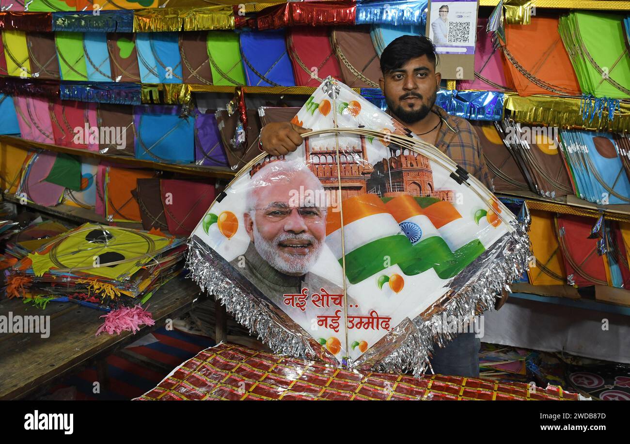 Ahmedabad, India. 13th Jan, 2024. A shopkeeper poses for a photo ...