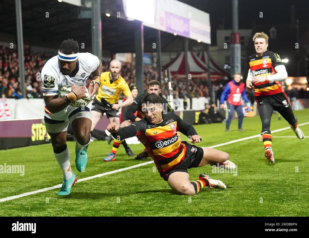 Castres Olympique's Josaia Raisuqe (left) scores their side's first try ...