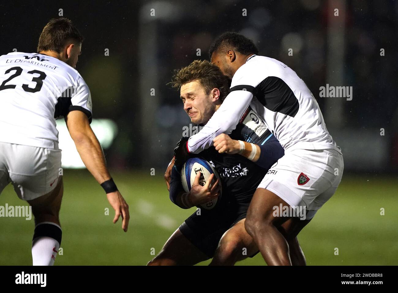 Glasgow Warriors' Kyle Rowe (centre) is tackled during the Investec ...