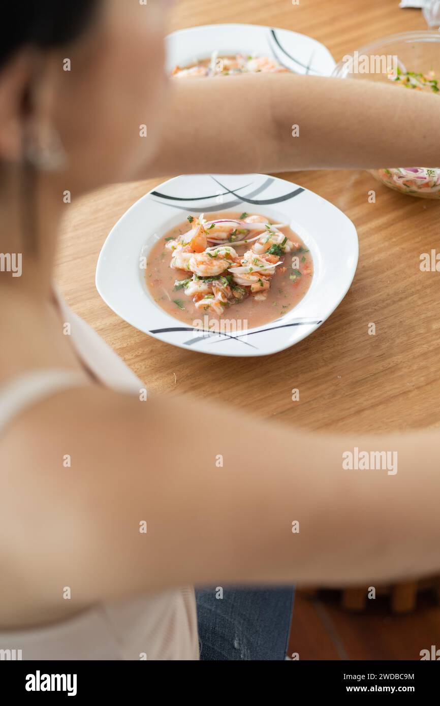 shrimp ceviche with shrimp, onions, tomato and spices as ingredients ...