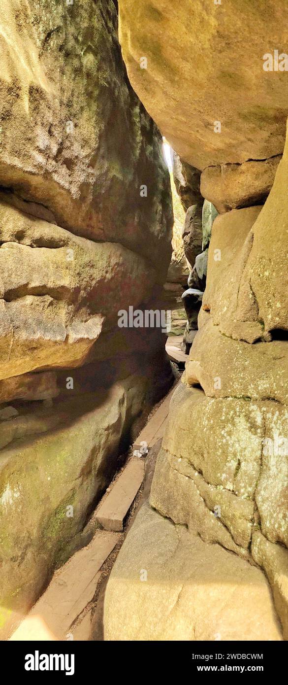 huge stone blocks of rock or rock separated by a narrow path through ...