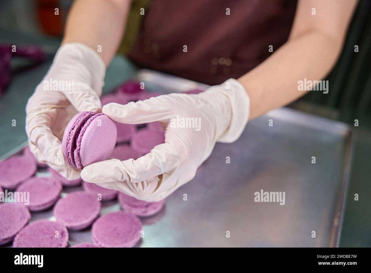 Professional baker is making yummy biscuits on worktop Stock Photo - Alamy