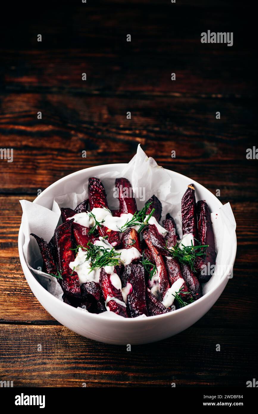 Oven baked beet fries with greek yogurt and dill dressing Stock Photo ...