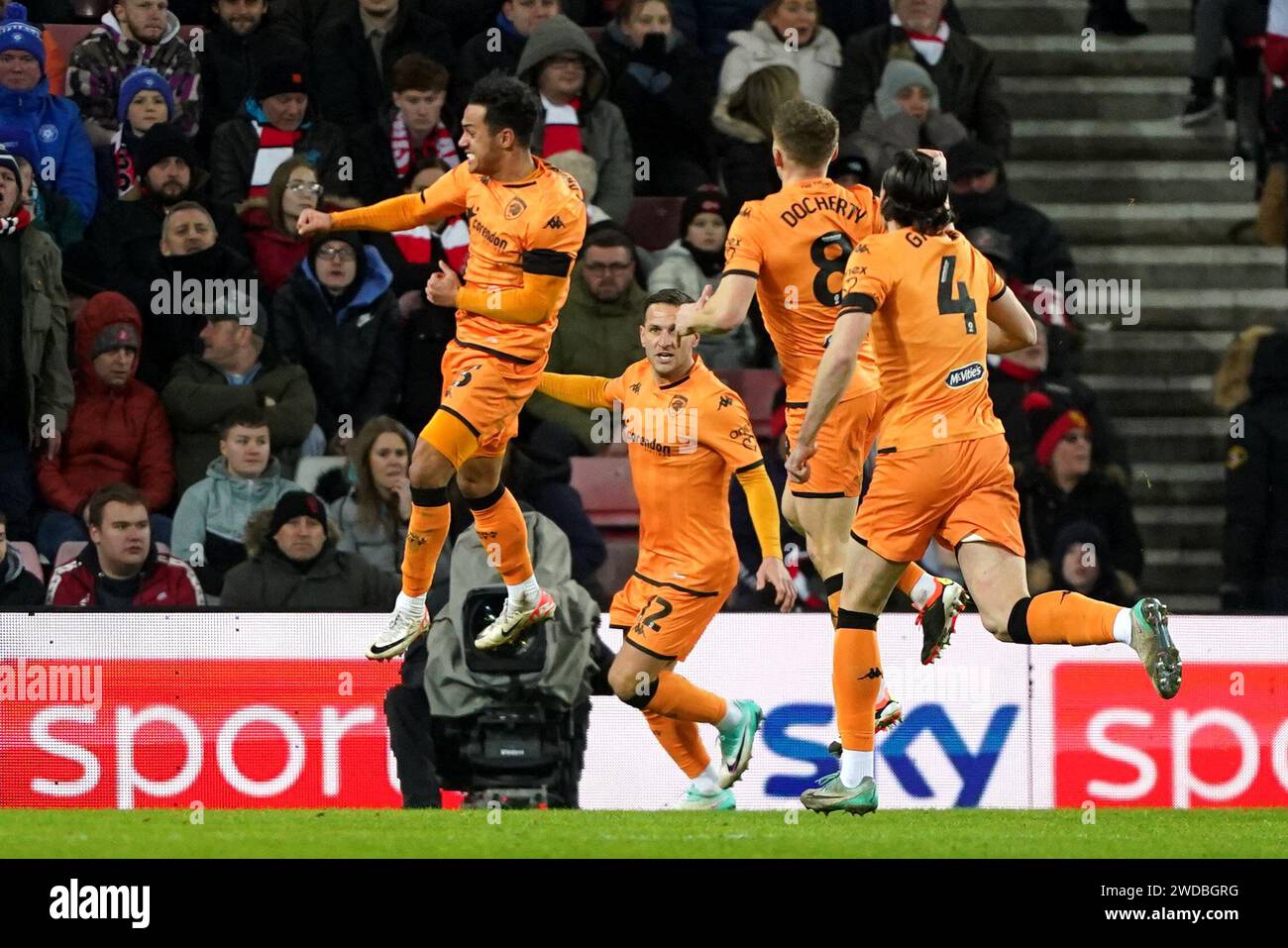 Hull City's Fabio Carvalho (left) scores their side's first goal of the ...