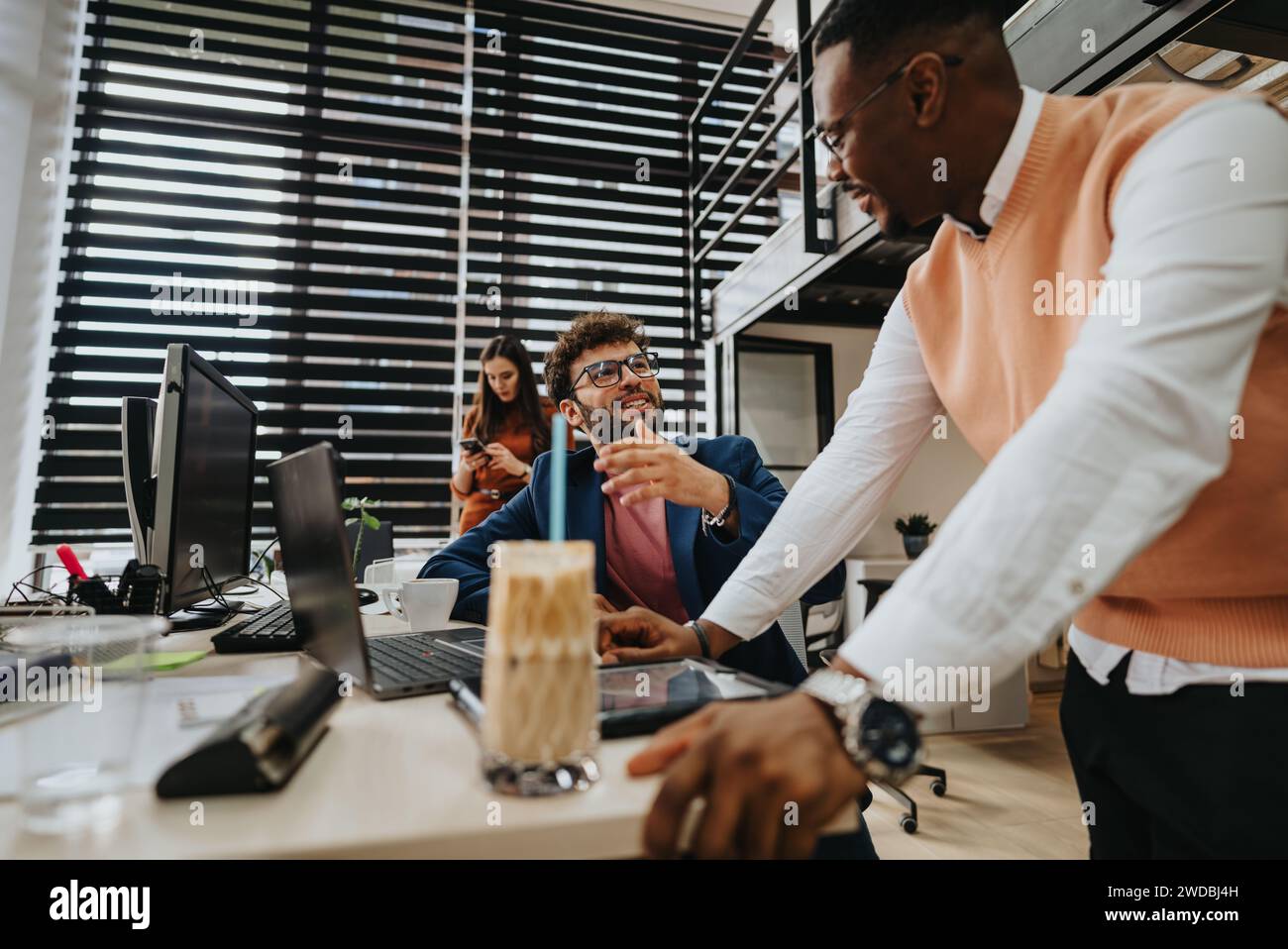 Multicultural Business Team Working Together on Project Stock Photo - Alamy