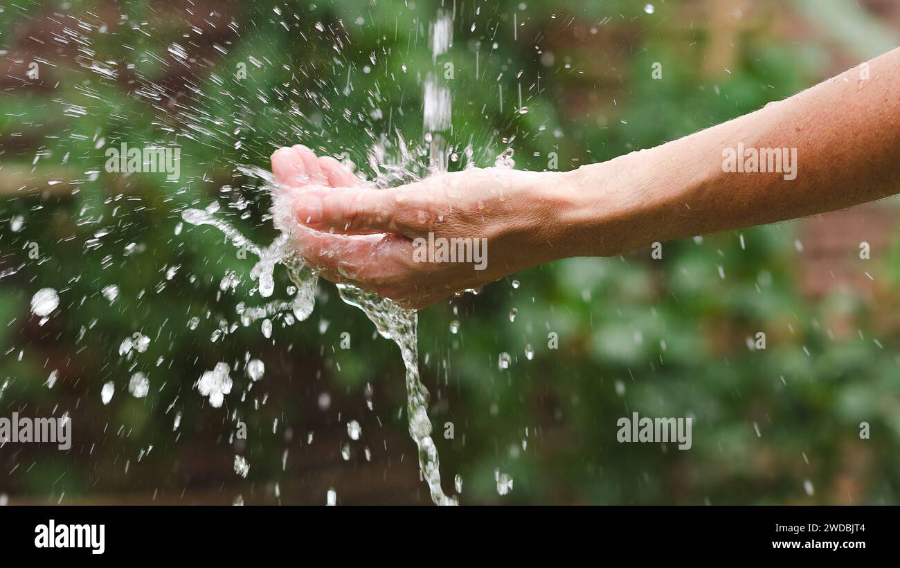 Woman young garden shower hi-res stock photography and images - Alamy