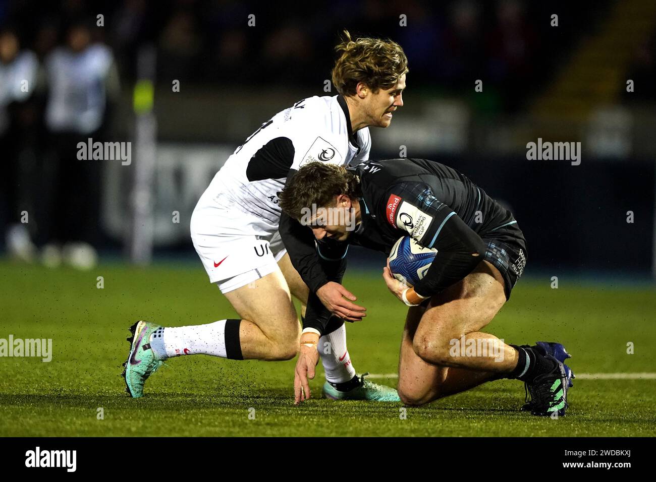 Glasgow Warriors' Josh McKay (right) is tackled by RC Toulon's Enzo ...