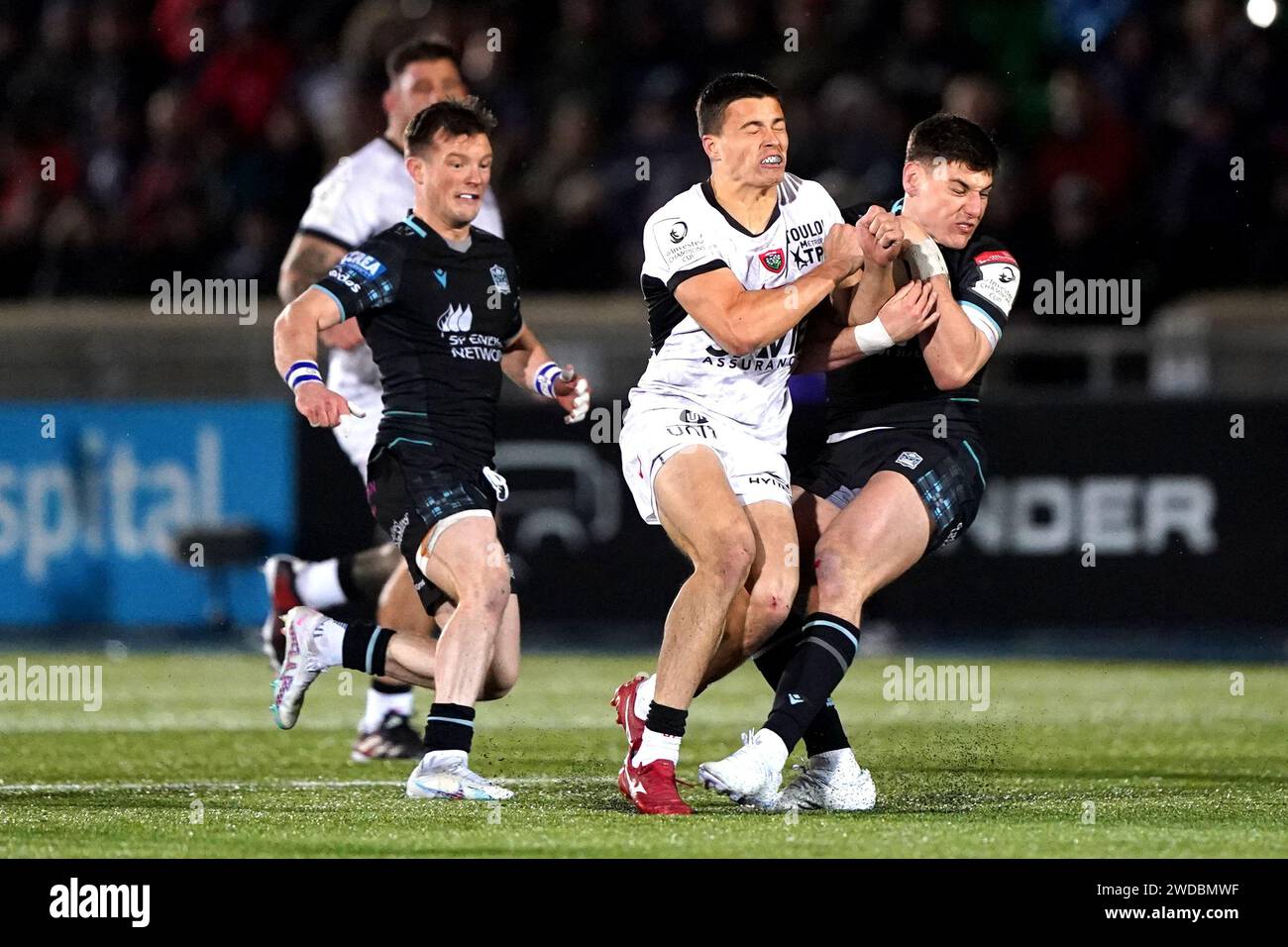 Glasgow Warriors' Tom Jordan (right) is tackled during the Investec ...