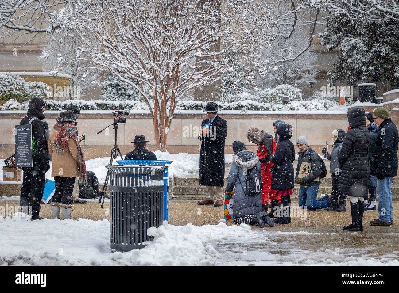Washington, District Of Columbia, USA. 19th Jan, 2024. People pray ...