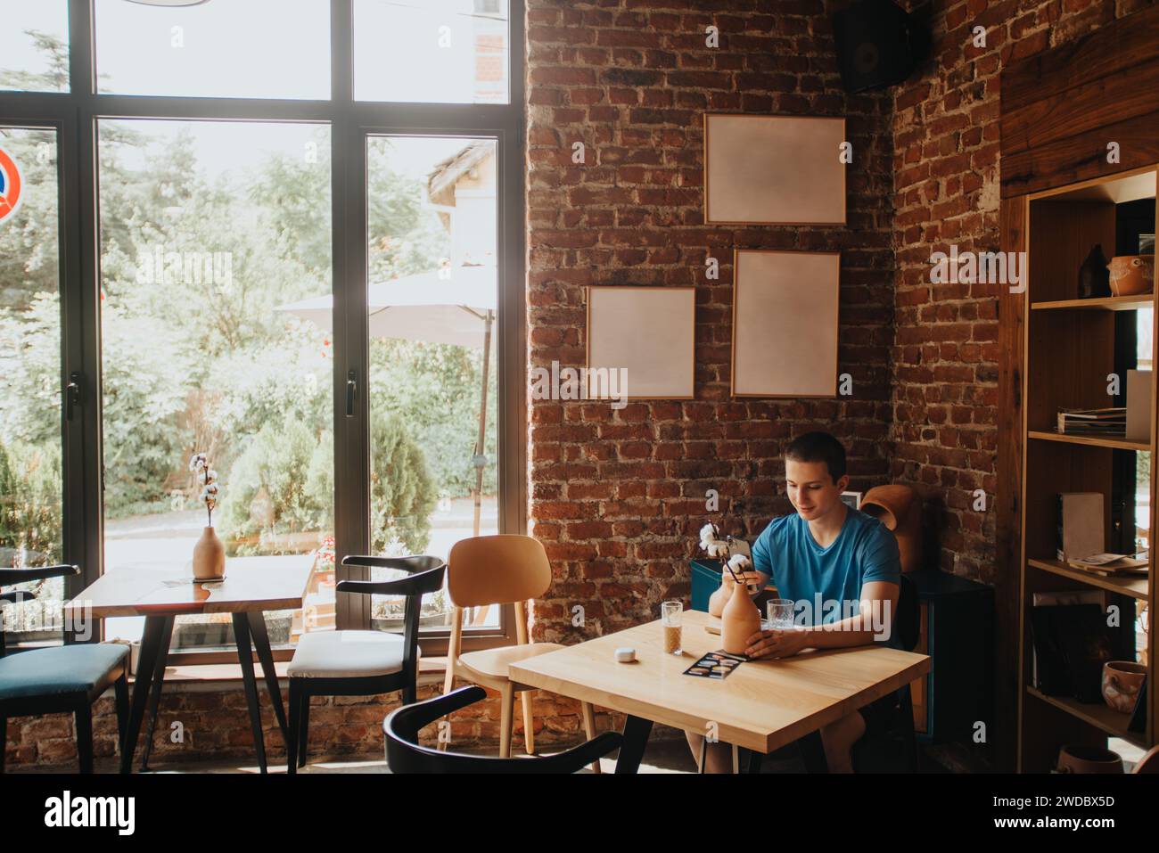 Handsome Caucasian School Boy Enjoying Coffee and Browsing Social Media ...