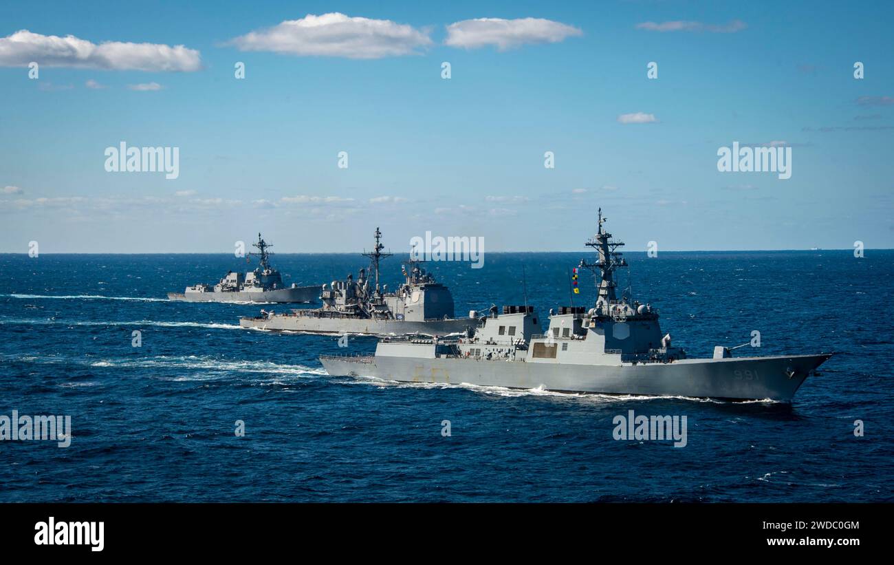 240116-N-TD381-1191 AT SEA (Jan. 16, 2024) From right to left, the ...