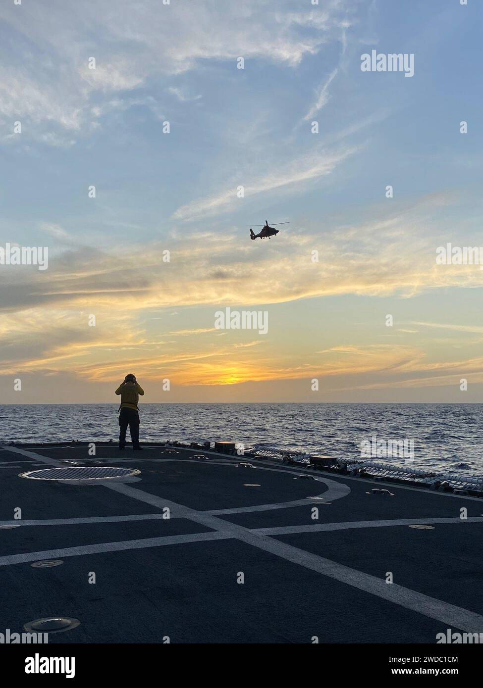 A Coast Guard MH-65 helicopter crew from the Helicopter Interdiction ...
